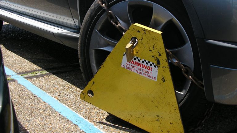 How do I report a car that I suspect has been left untaxed on my street ...